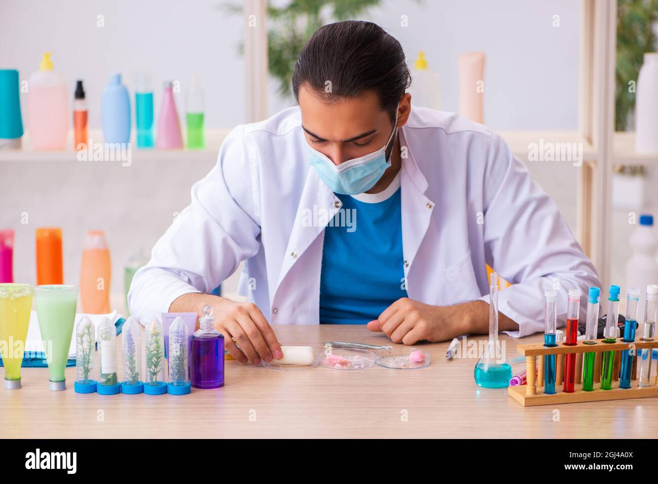 Young chemist testing soap in the lab Stock Photo - Alamy