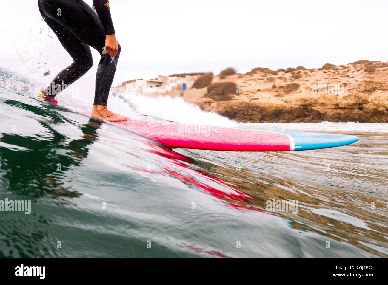 Female longboard surfing hi-res stock photography and images - Alamy