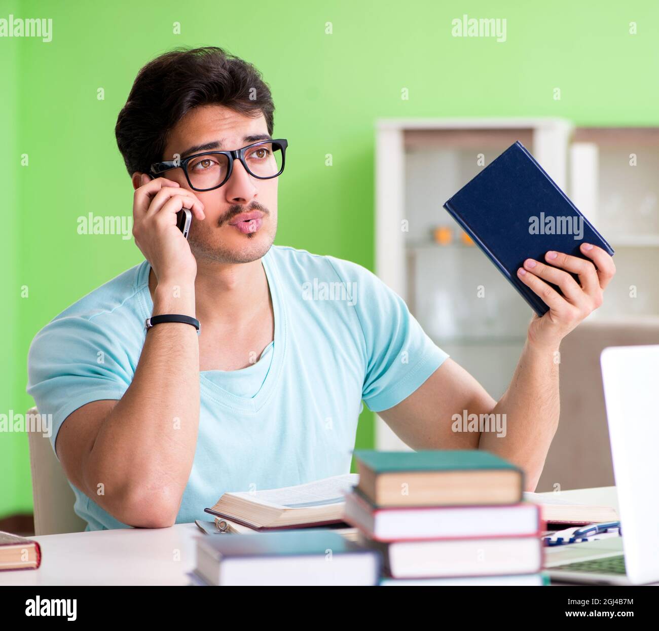 The student preparing for university exams at home Stock Photo - Alamy