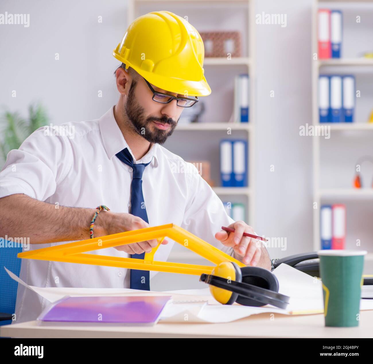 The architect working in his studio on new project Stock Photo - Alamy