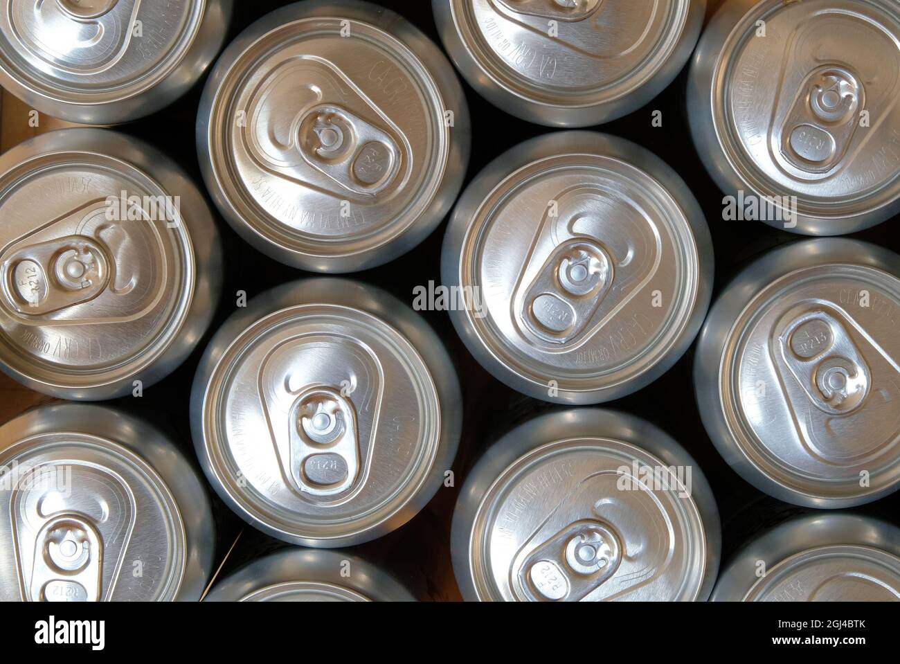Overhead view of aluminum can flip top lids with redemption values for ...