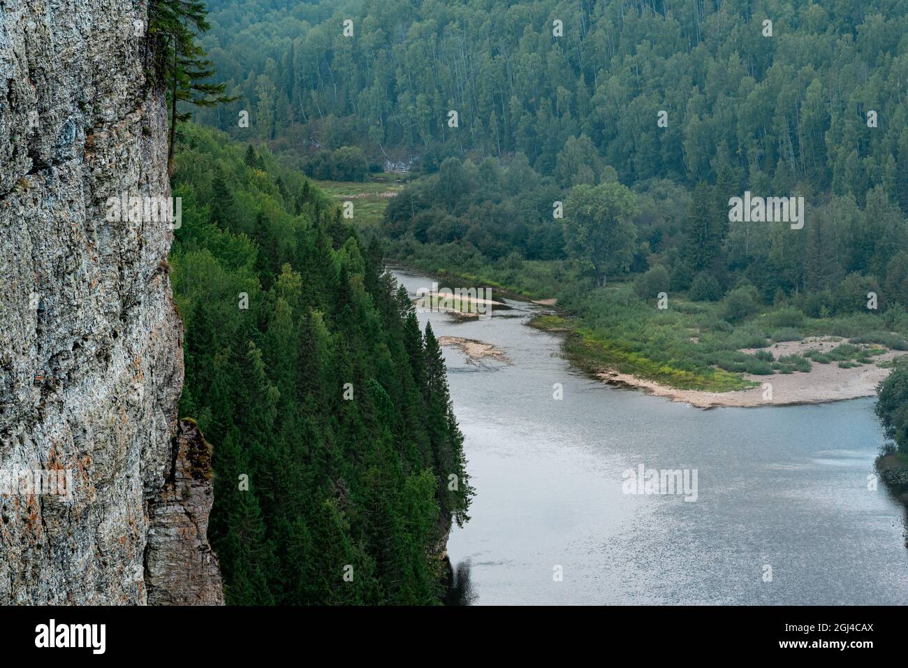 mountain river among wooded banks, view from the top of the cliff, Usva ...