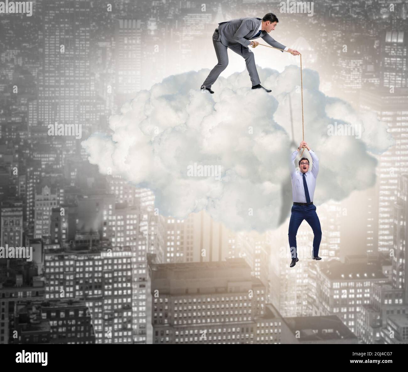 The businessman saving colleague by pulling rope Stock Photo - Alamy