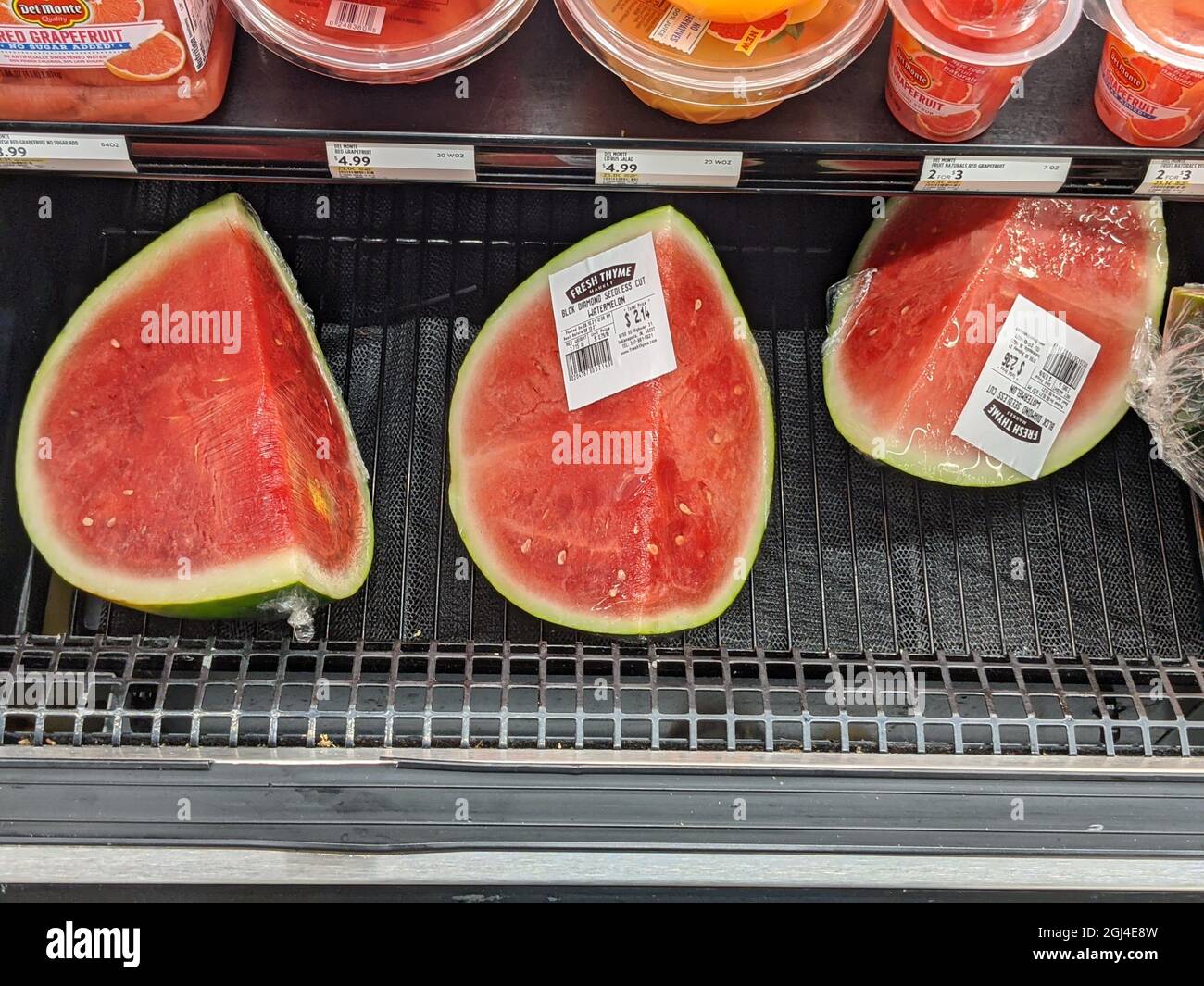 Watermelon available for purchase at the grocery store Stock Photo - Alamy