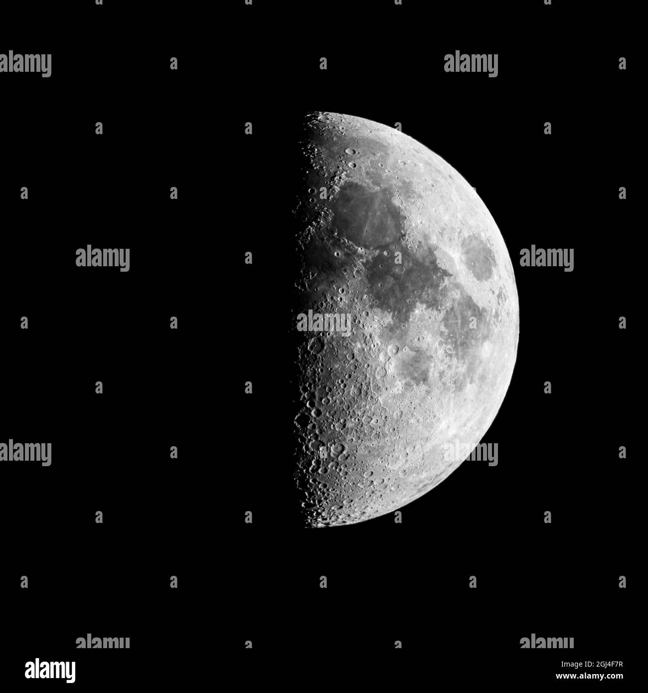Beautiful textured gray half moon in a black sky Stock Photo - Alamy