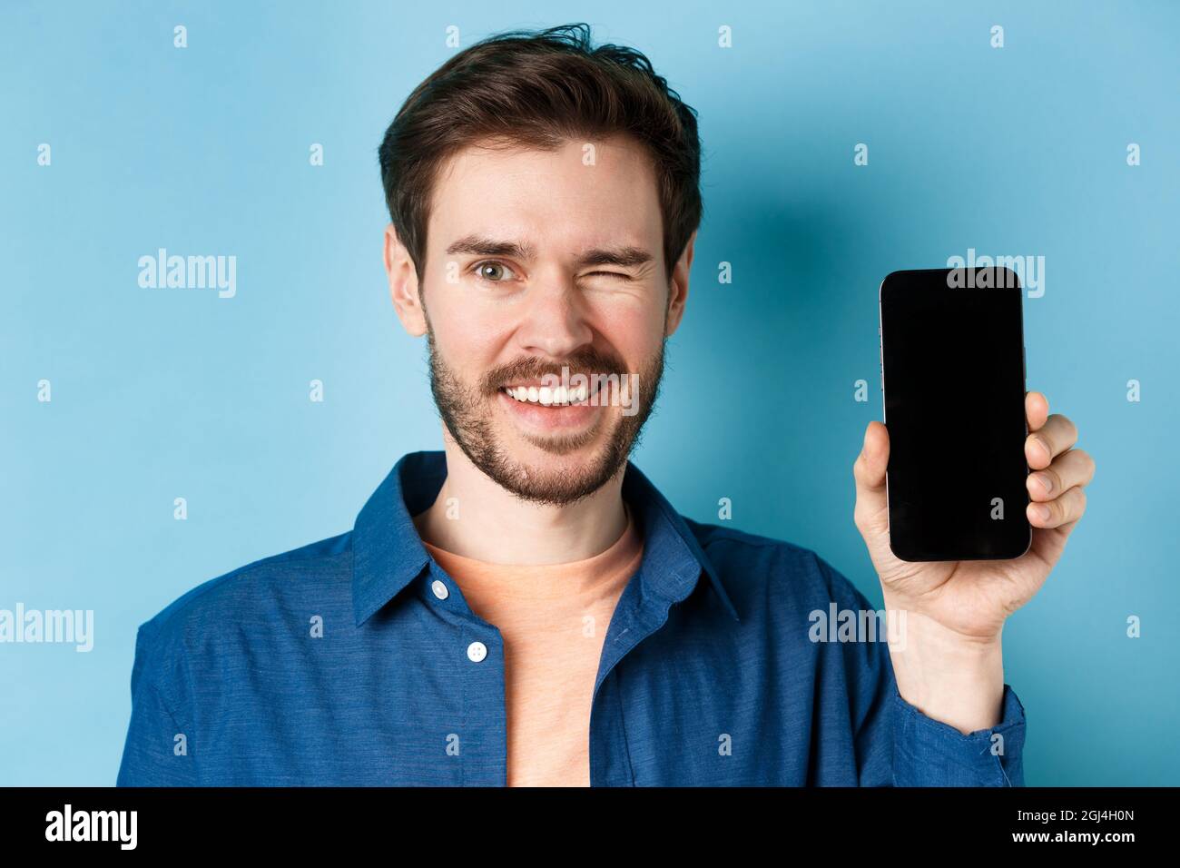 Man smiling winking hi-res stock photography and images - Alamy
