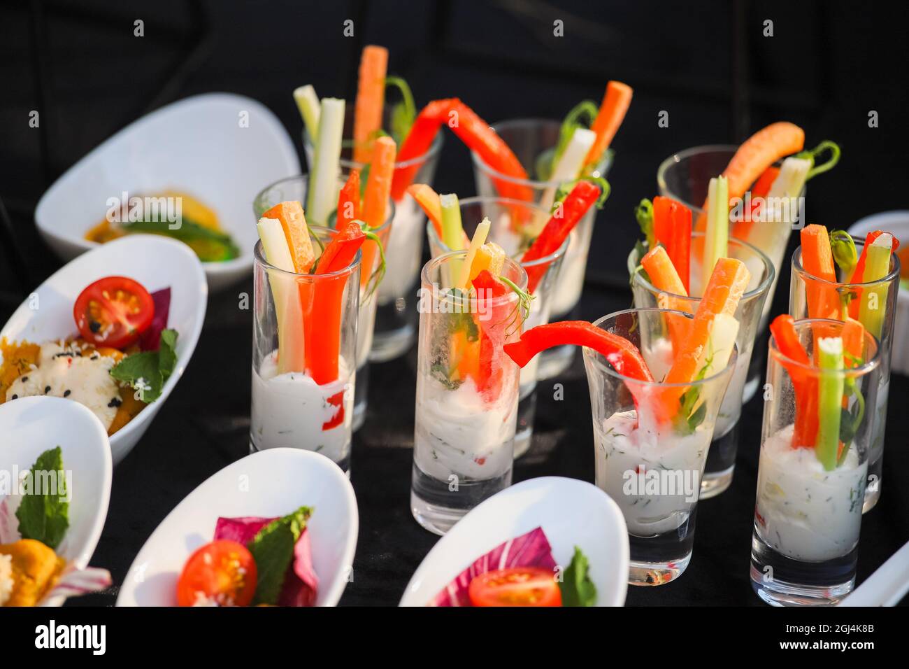 Vegetables in sauce on a buffet table, sweet paprika and carrots Stock ...