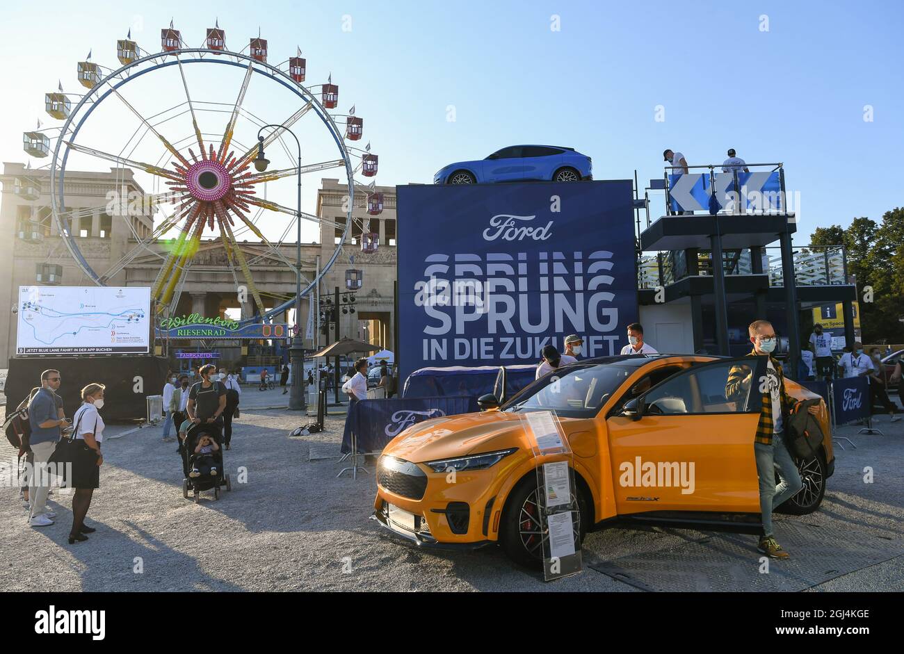 Munich, Germany. 8th Sep, 2021. People visit the Ford outdoor booth ...