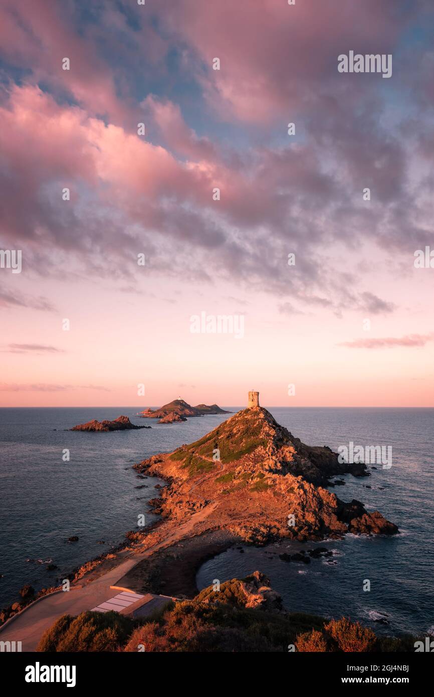 Sunrise over the Genoese tower and lighthouse at Pointe de la Parata ...