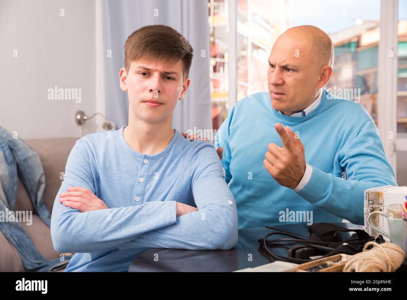 Man scolding son at home Stock Photo - Alamy