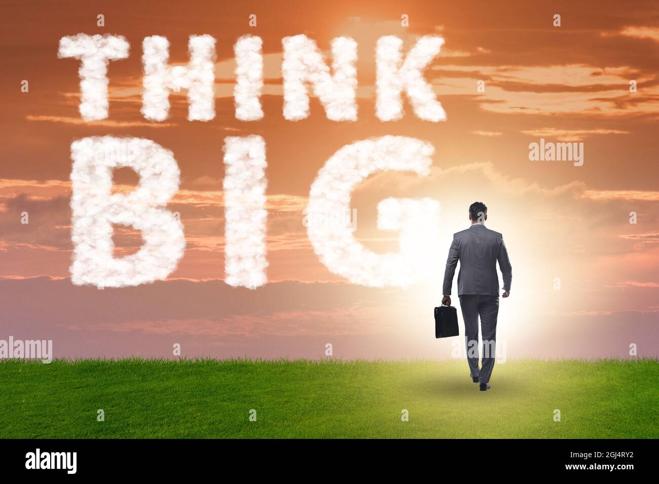 Think big concept with the businessman Stock Photo - Alamy