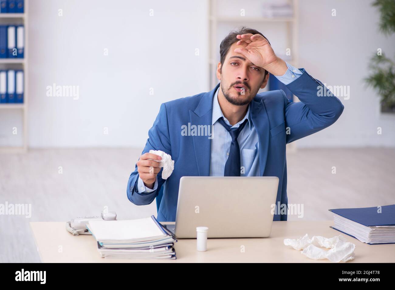 Sick young businessman coughing throat hi-res stock photography and ...