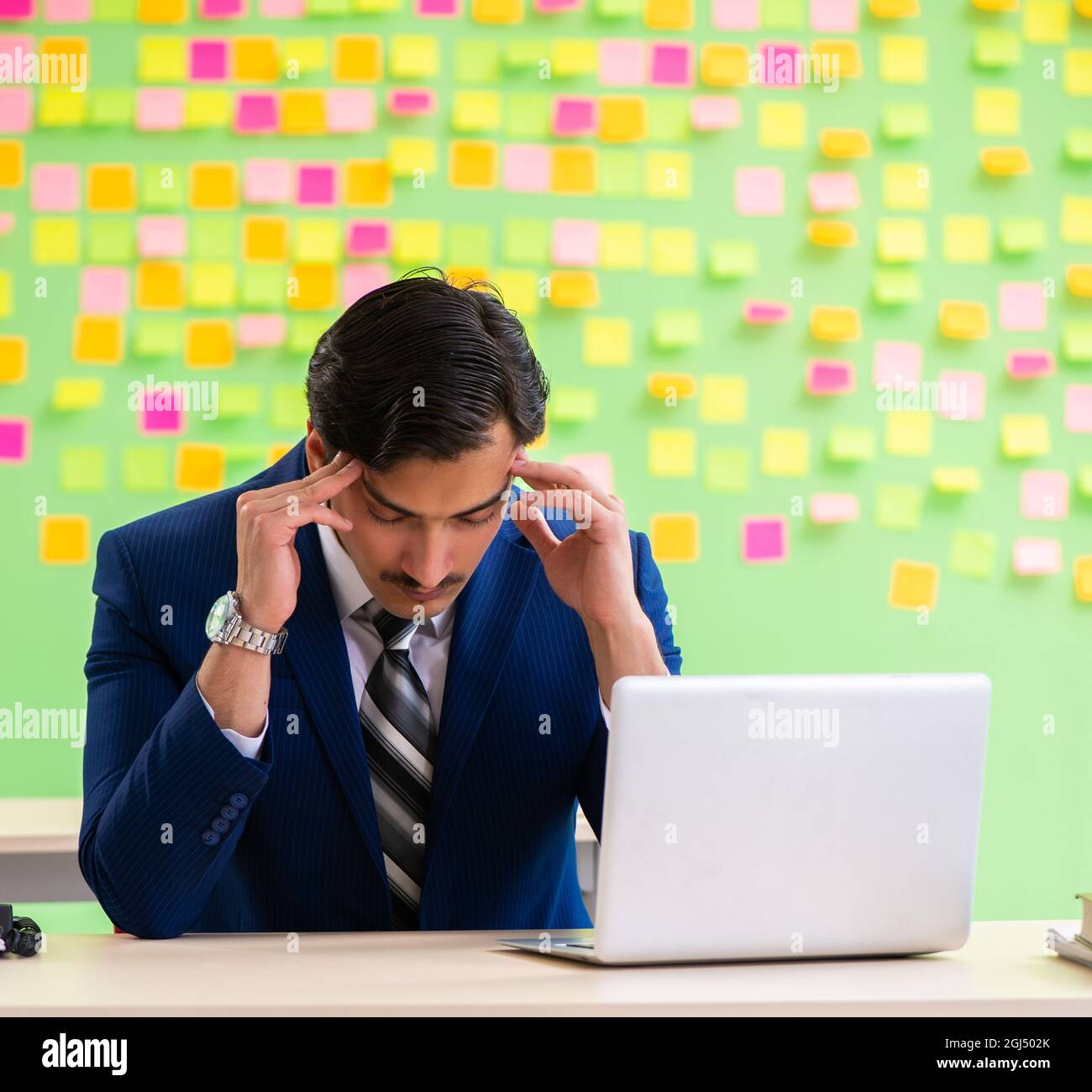 The businessman with many conflicting priorities Stock Photo - Alamy
