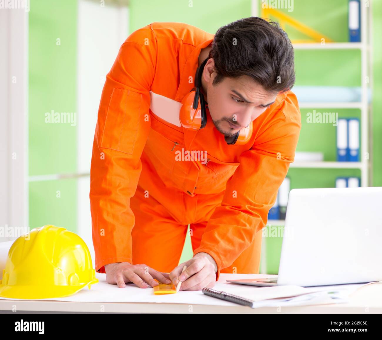 The construction supervisor planning new project in office Stock Photo ...