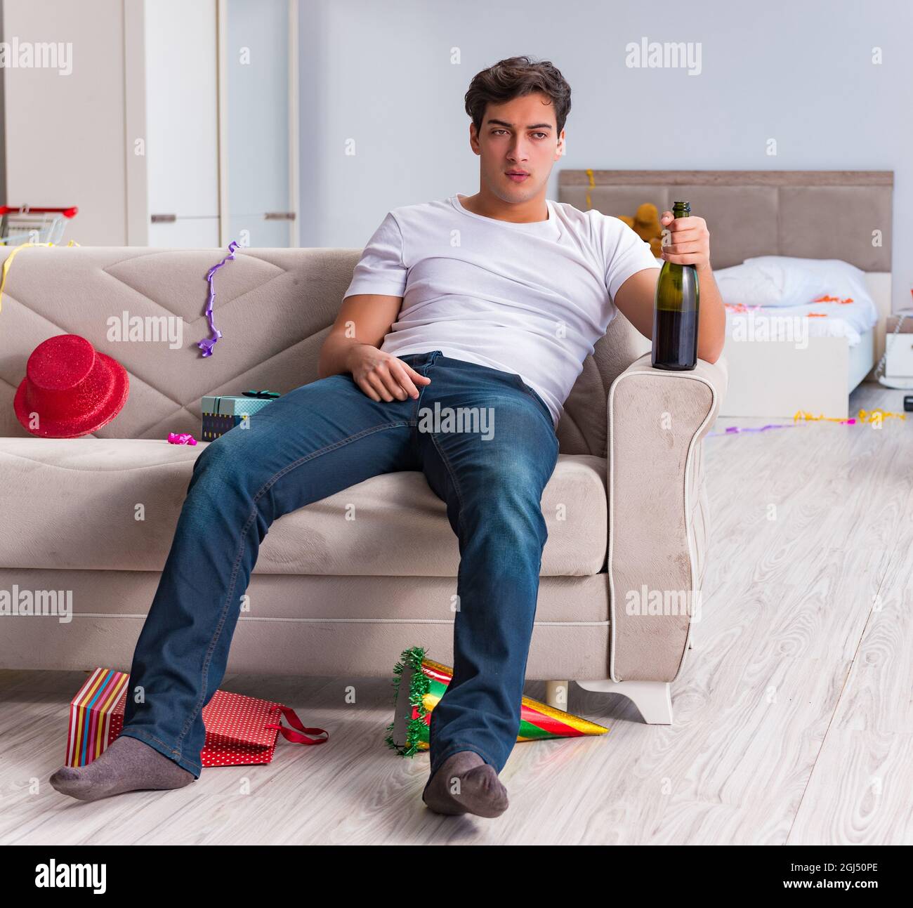 The man after heavy christmas partying at home Stock Photo - Alamy