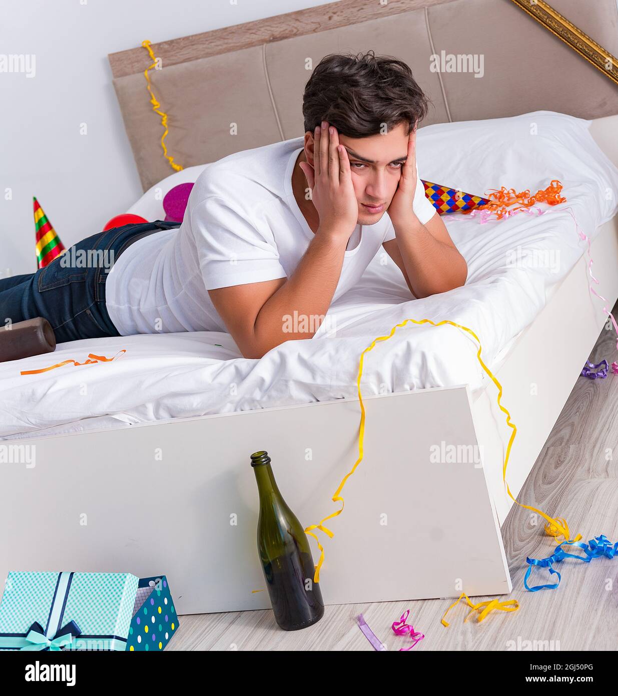The man after heavy christmas partying at home Stock Photo - Alamy