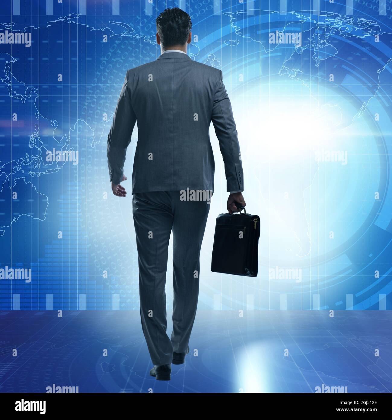 The businessman walking away from the camera Stock Photo - Alamy