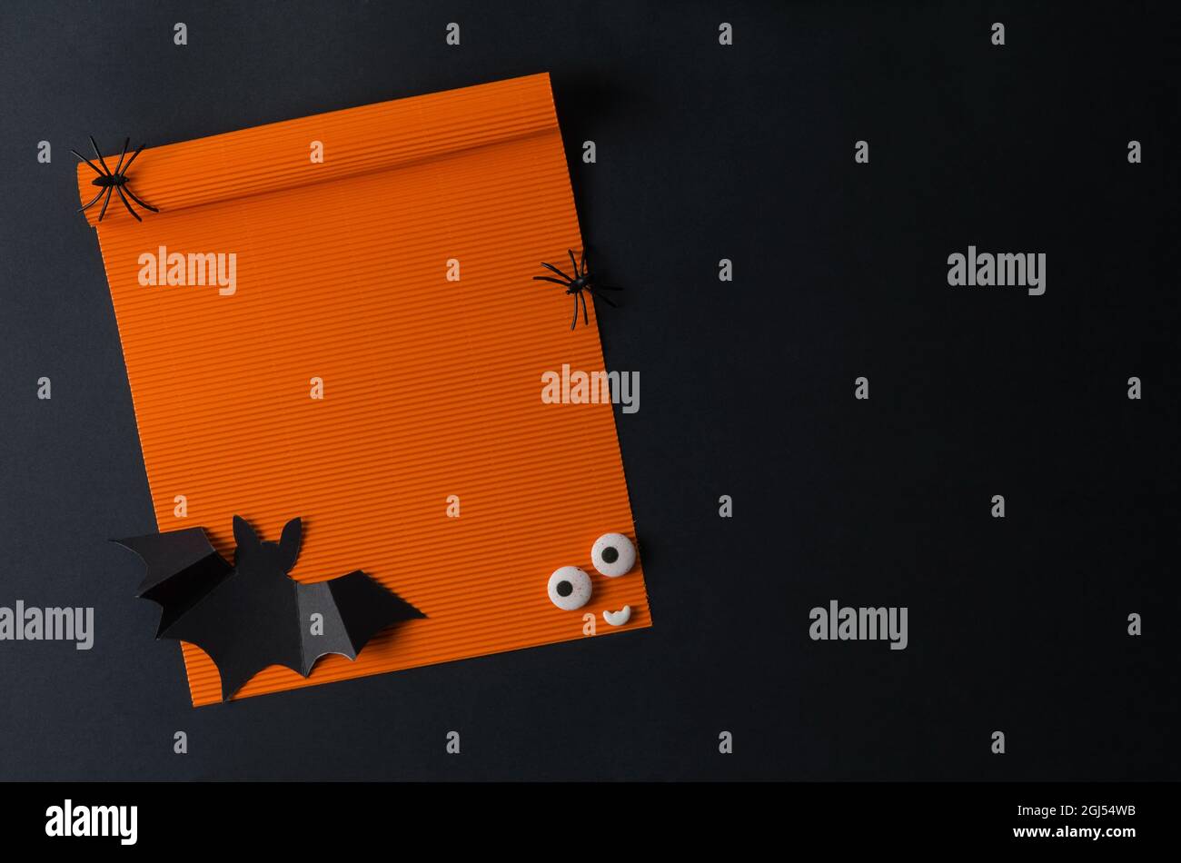 Mock up for Halloween with orange poster on black background and ...