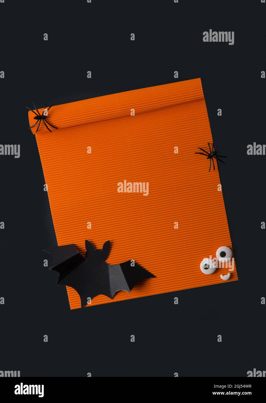 Mock up for Halloween with orange poster on black background and ...
