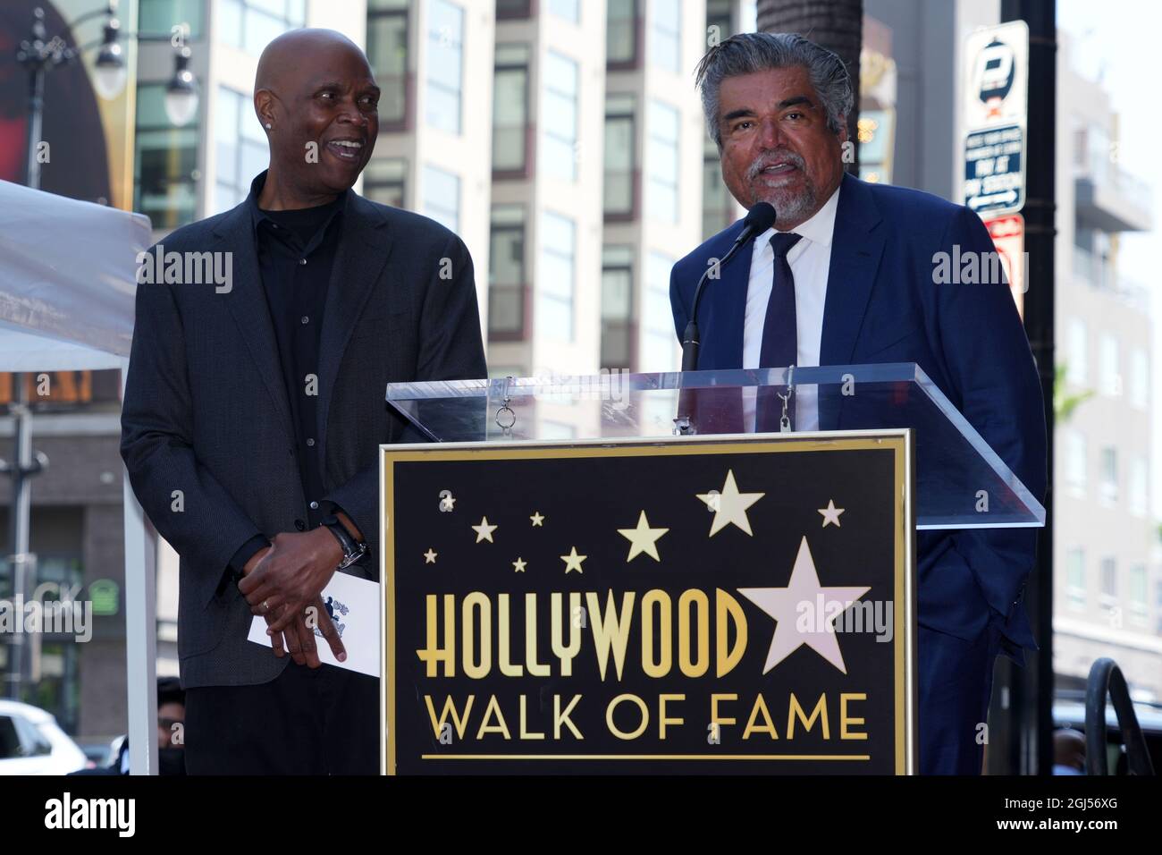 Radio personality Kurt Alexander aka Big Boy (left) listens at George ...