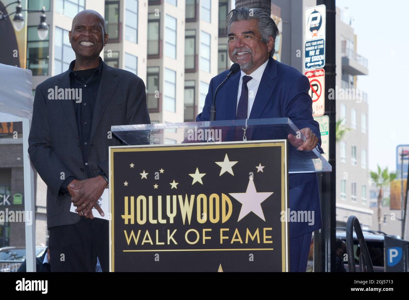 Radio personality Kurt Alexander aka Big Boy (left) listens at George ...