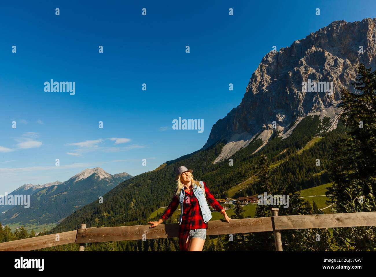 Young beautiful woman traveler , mountains Alps background Stock Photo ...