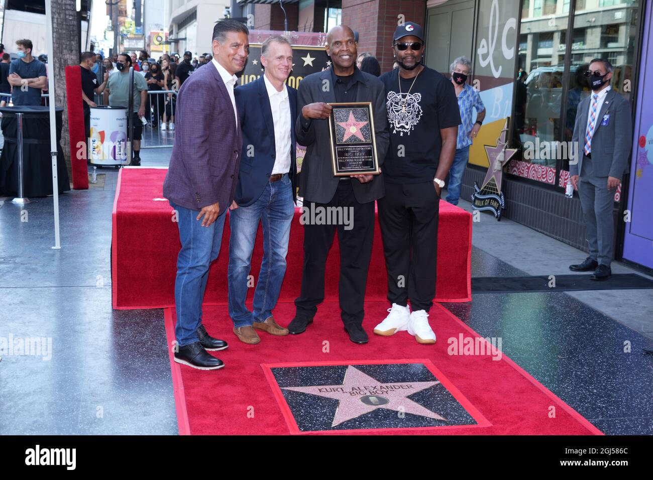 Radio personality Kurt Alexander aka Big Boy (second from right) poses ...