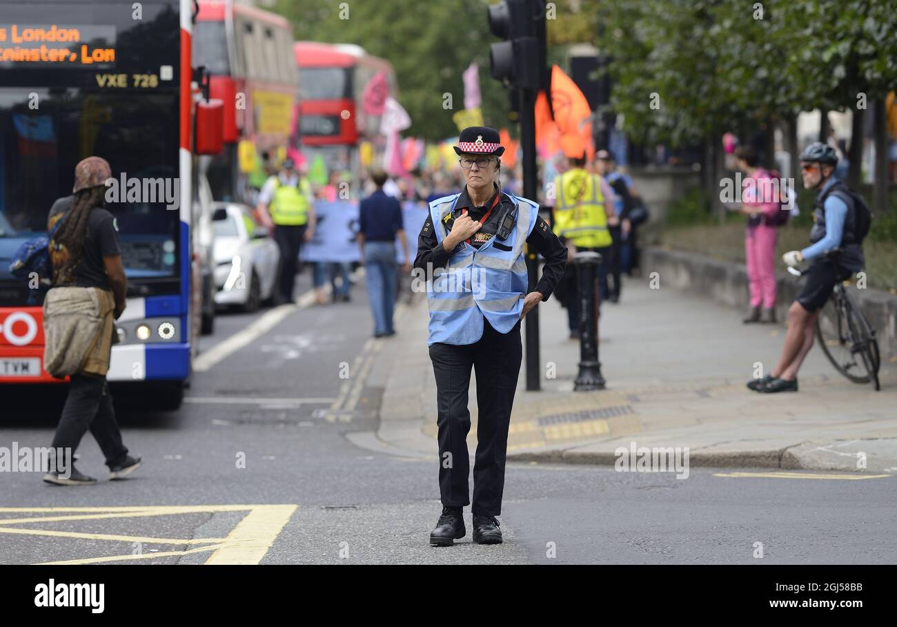 London, England, UK. Police liaison officer at a protest by Extinction ...