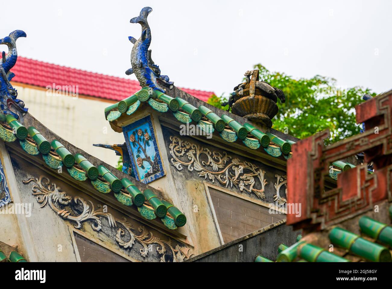 Colorful roofs of ancient Chinese Lingnan-style buildings Stock Photo ...