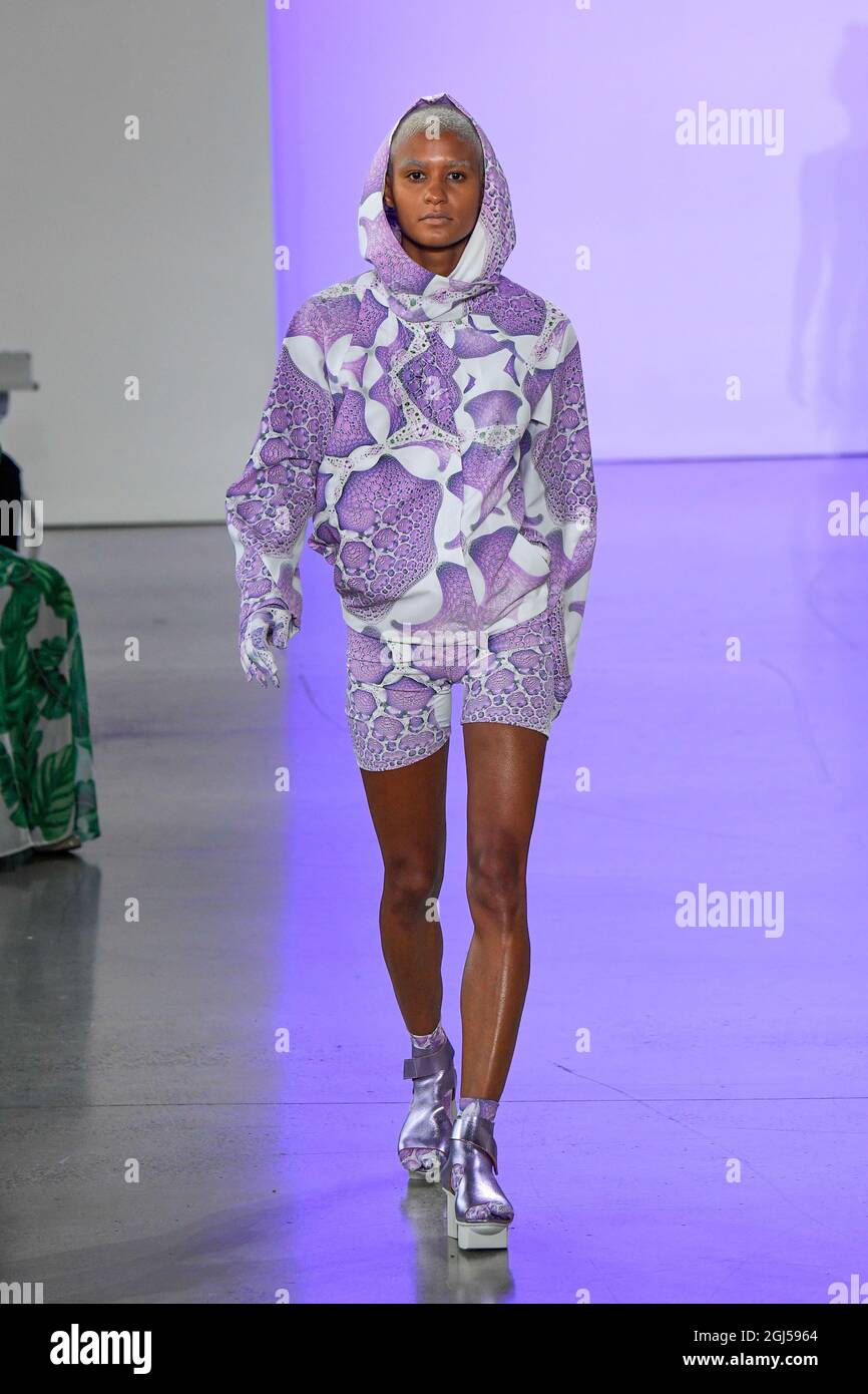 A model walks the runway during the Threeasfour Spring 2021 Ready-to ...