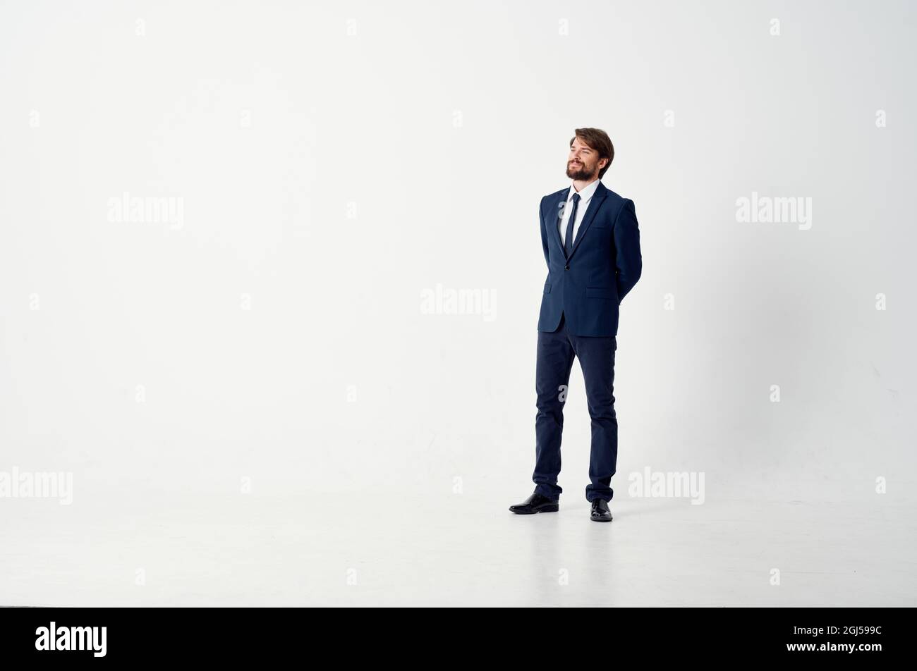 The man in a suit posing executive office Studio Stock Photo - Alamy