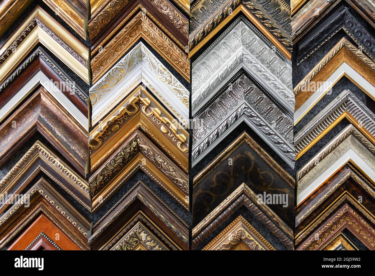 Colorful samples of picture frames molding. Close-up Stock Photo - Alamy