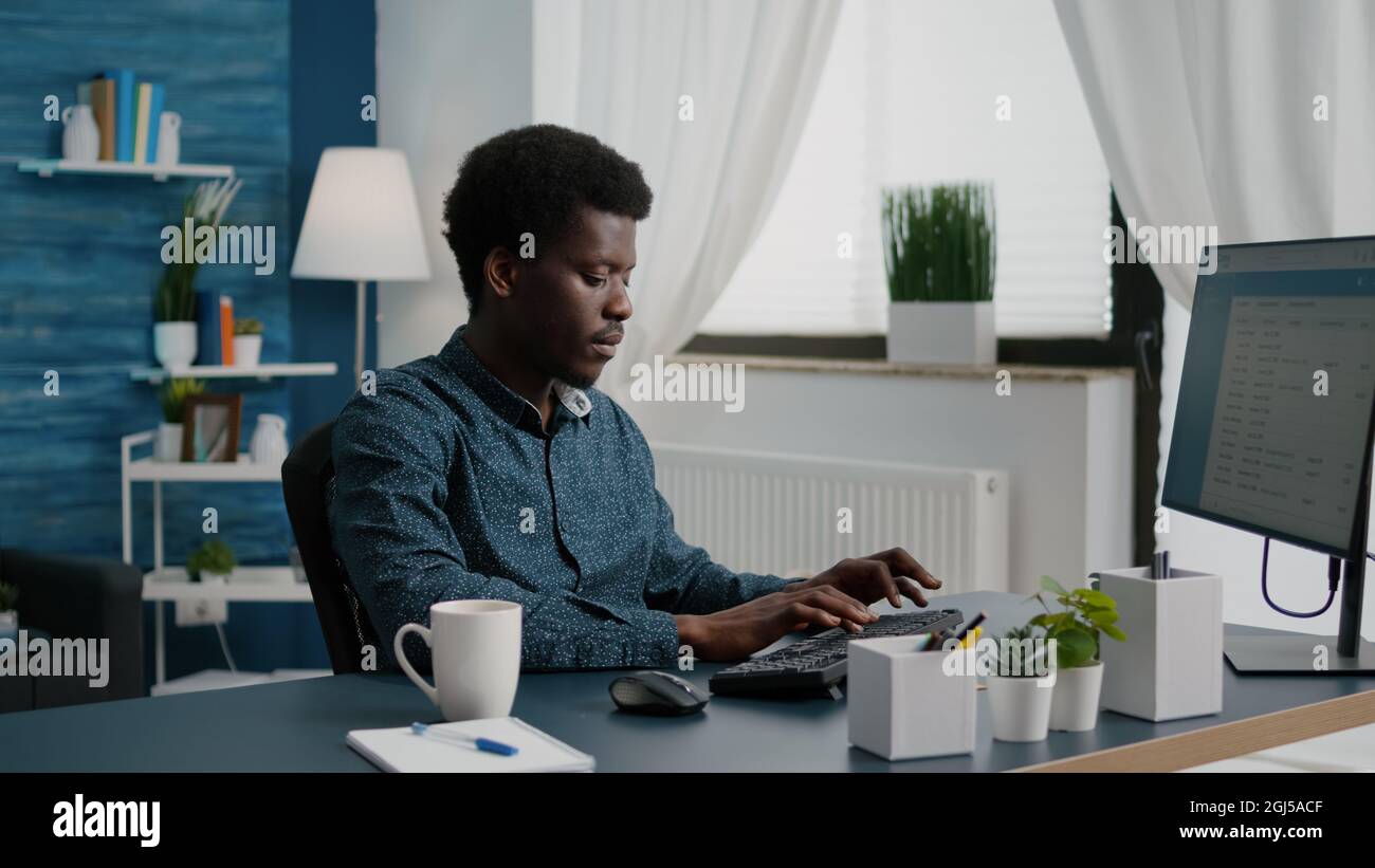 Confident remote african american black man worker doing his job from ...