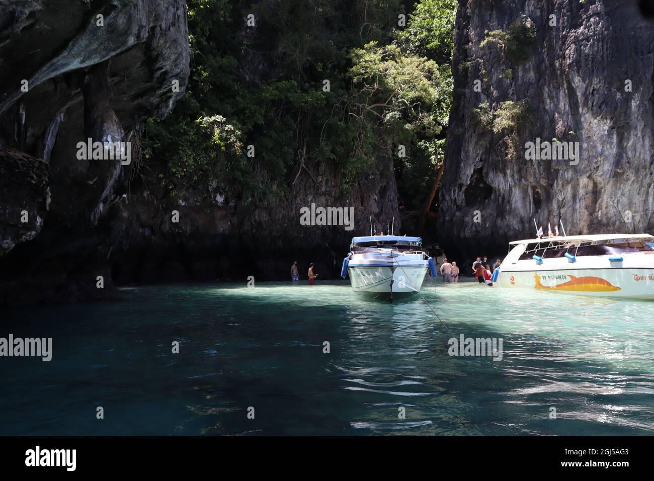 Boating near tropical islands waves and splashes Stock Photo - Alamy