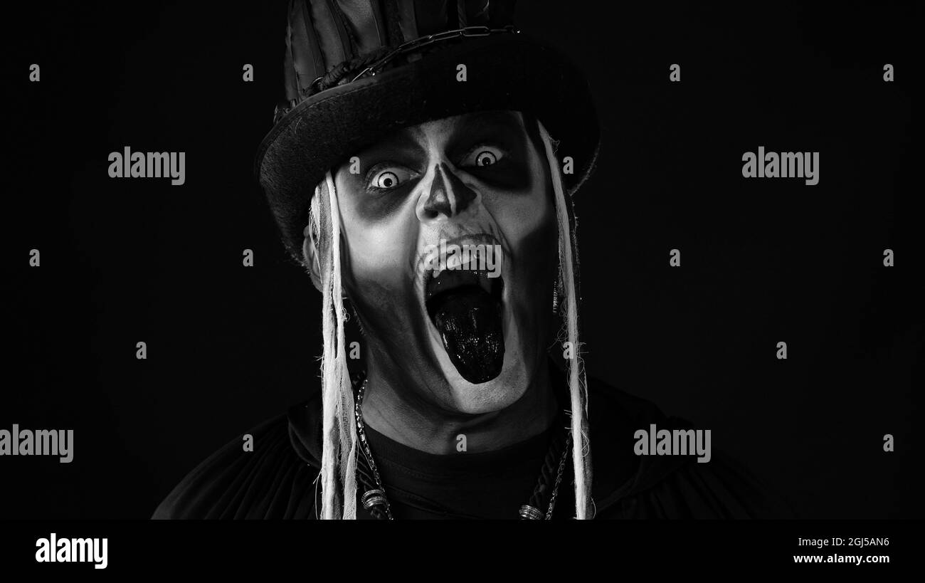 Frightening man in skeleton Halloween cosplay costume. Guy in creepy ...