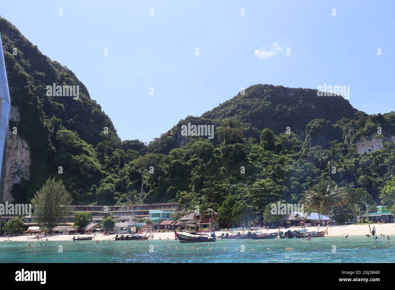 Boating near tropical islands waves and splashes Stock Photo - Alamy