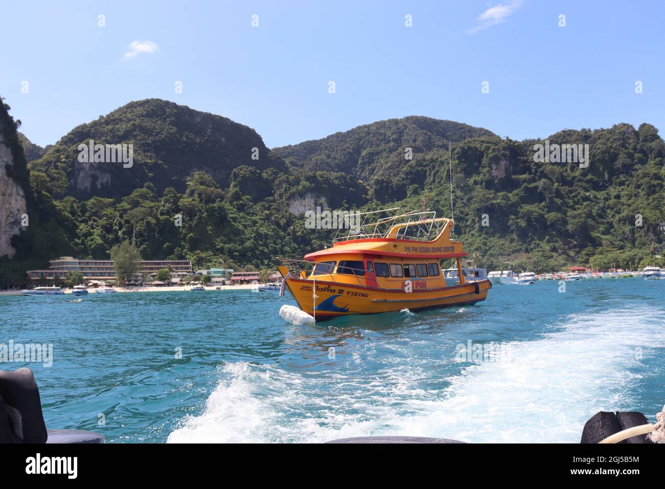 Boating near tropical islands waves and splashes Stock Photo - Alamy