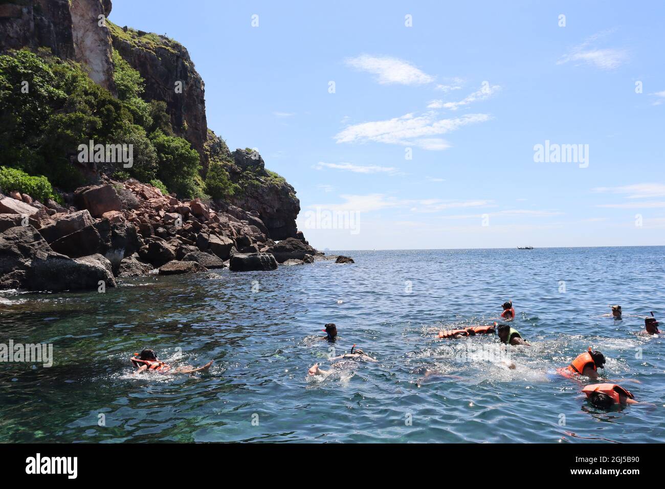 Boating near tropical islands waves and splashes Stock Photo - Alamy