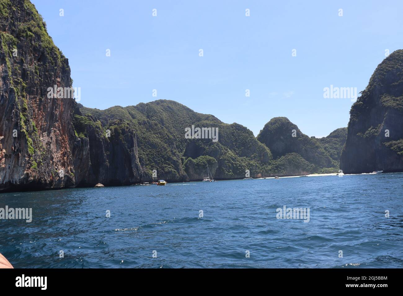 Boating near tropical islands waves and splashes Stock Photo - Alamy