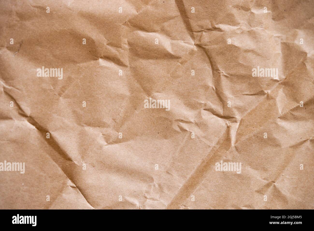 Wrinkled paper background Stock Photo - Alamy