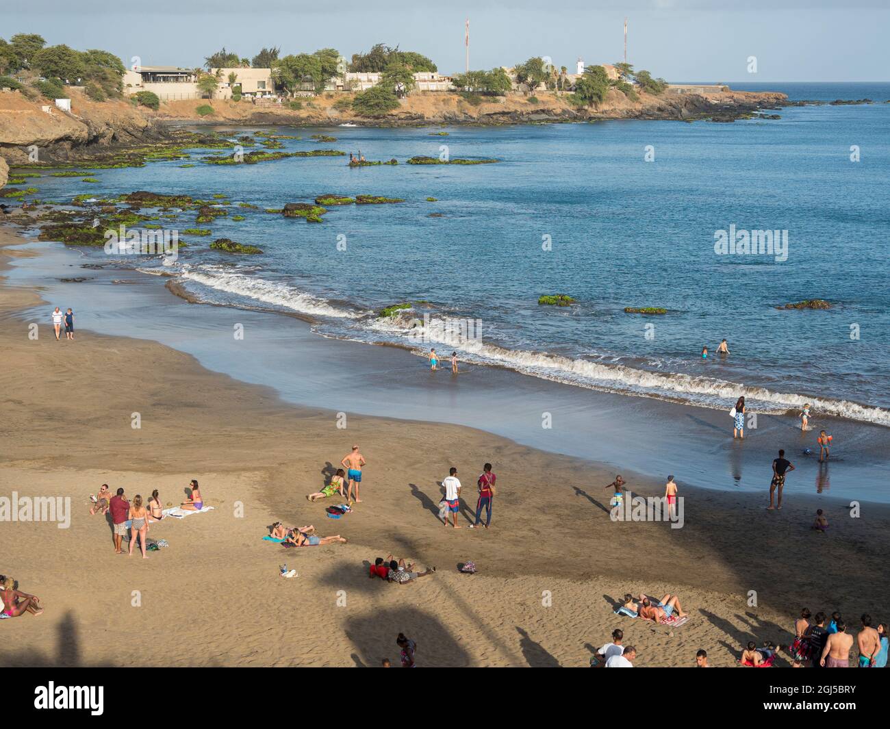 The busy beach at Prainha. The capital Praia on the Ilha de Santiago ...