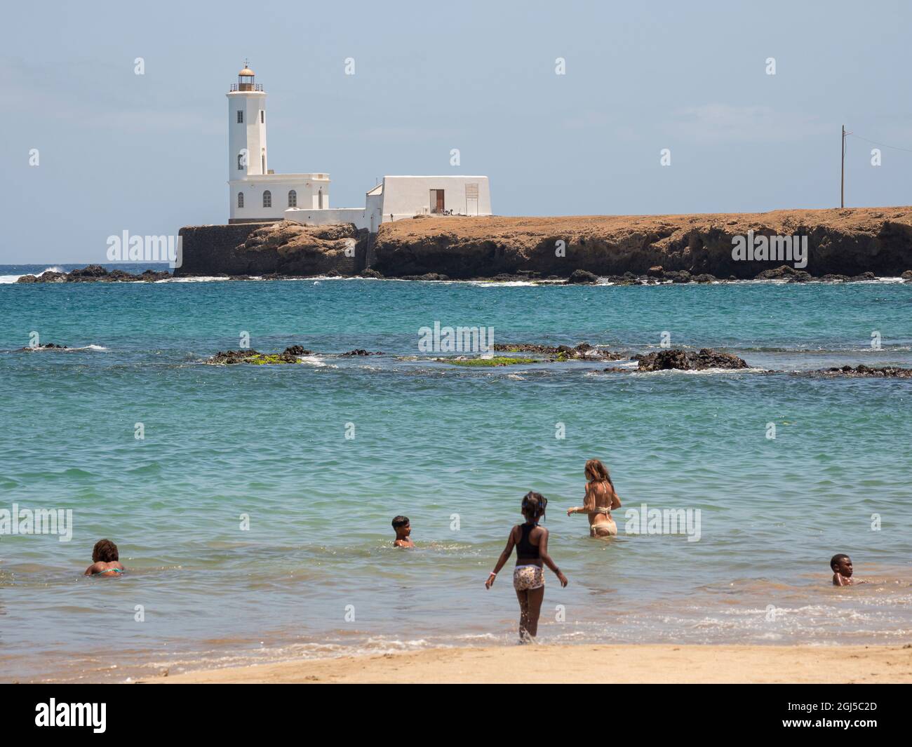 The busy beach at Prainha. The capital Praia on Santiago Island (Ilha ...