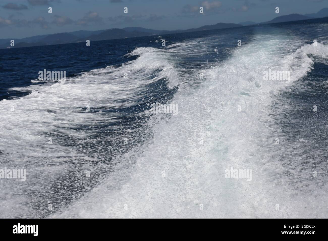 Wakeboarder boat hi-res stock photography and images - Alamy