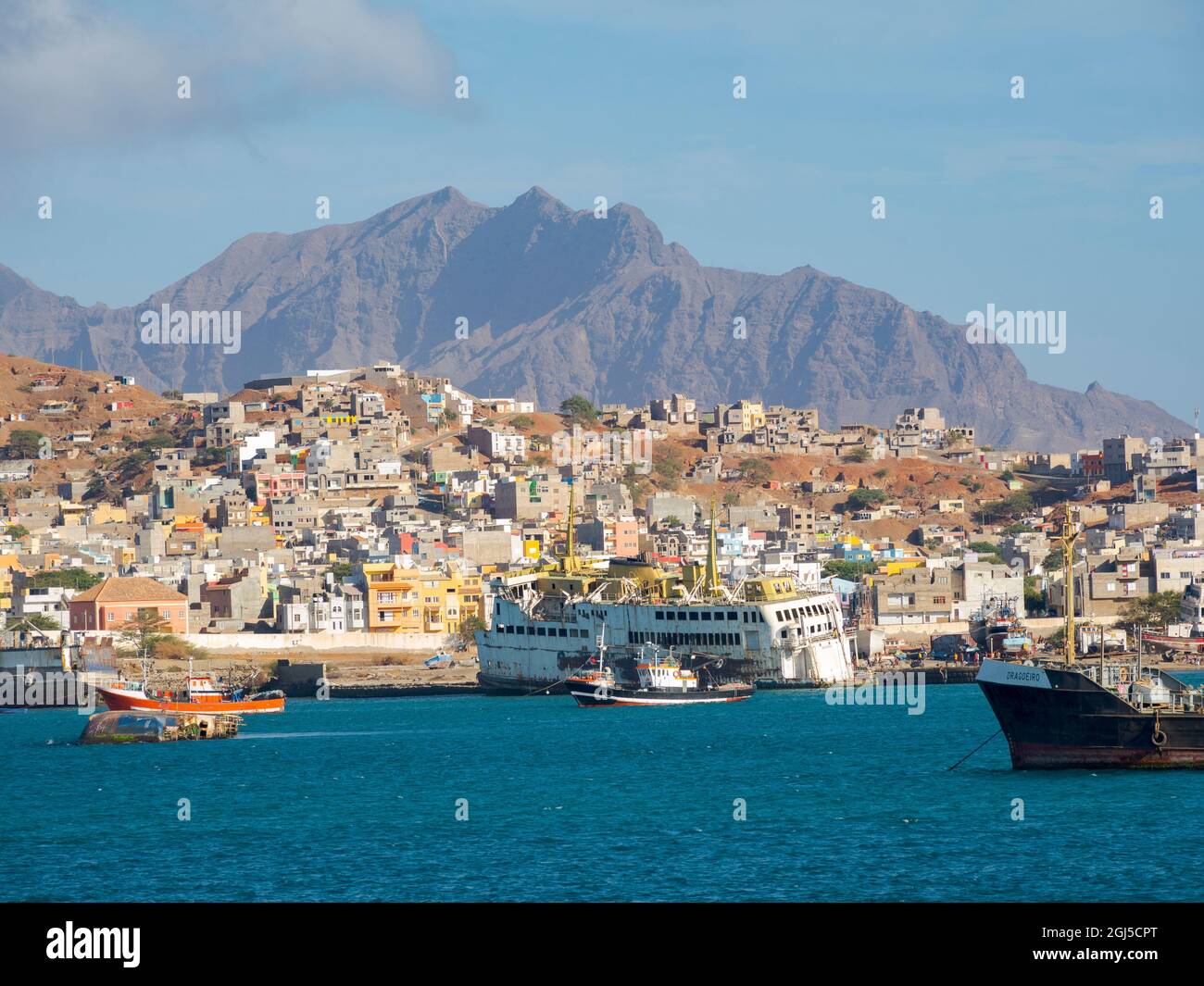 The harbor, a shipwreck on the beach. City Mindelo, a seaport on the ...