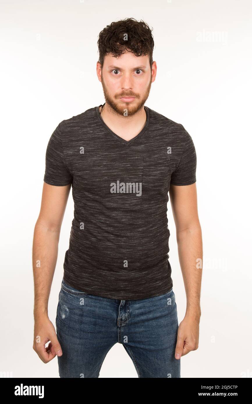 portrait isolated caucasian young man with serious expression with arms ...