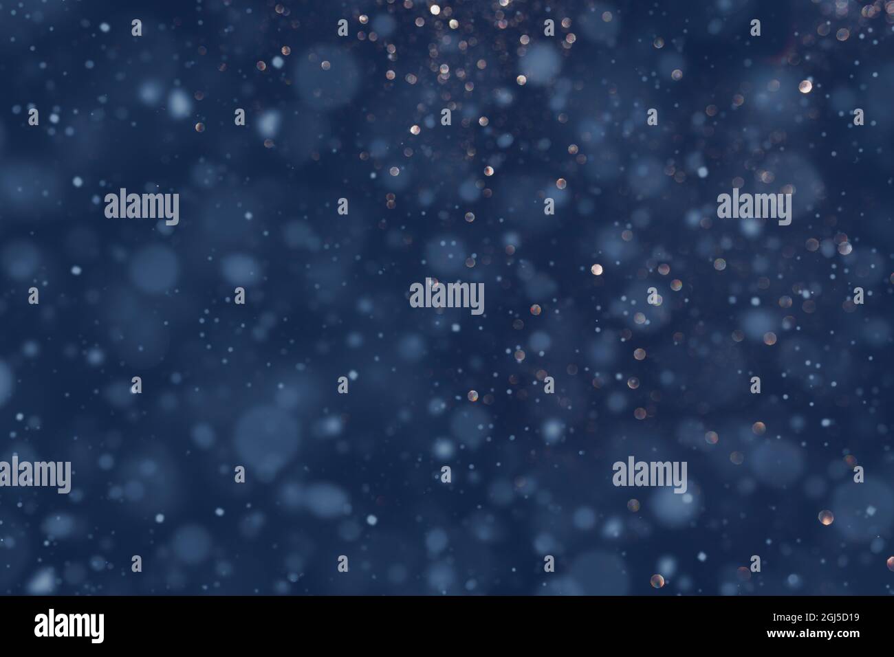 Snow falling light blue background hi-res stock photography and images ...