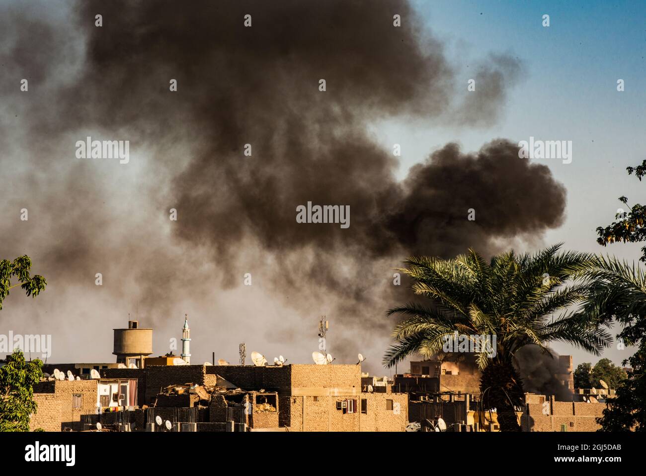 Upper Egypt, Luxor (formerly Thebes), fire in the city seen from Winter ...