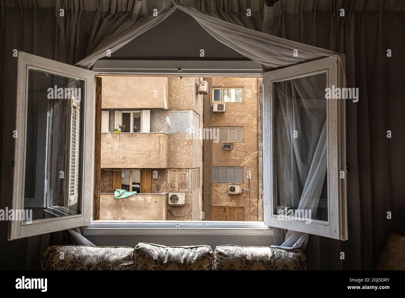 Africa, Egypt, Cairo. View of an apartment building and balconies ...