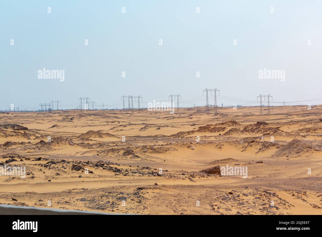 Egypt. Vast electrical grid and towers across the desert near Aswan ...