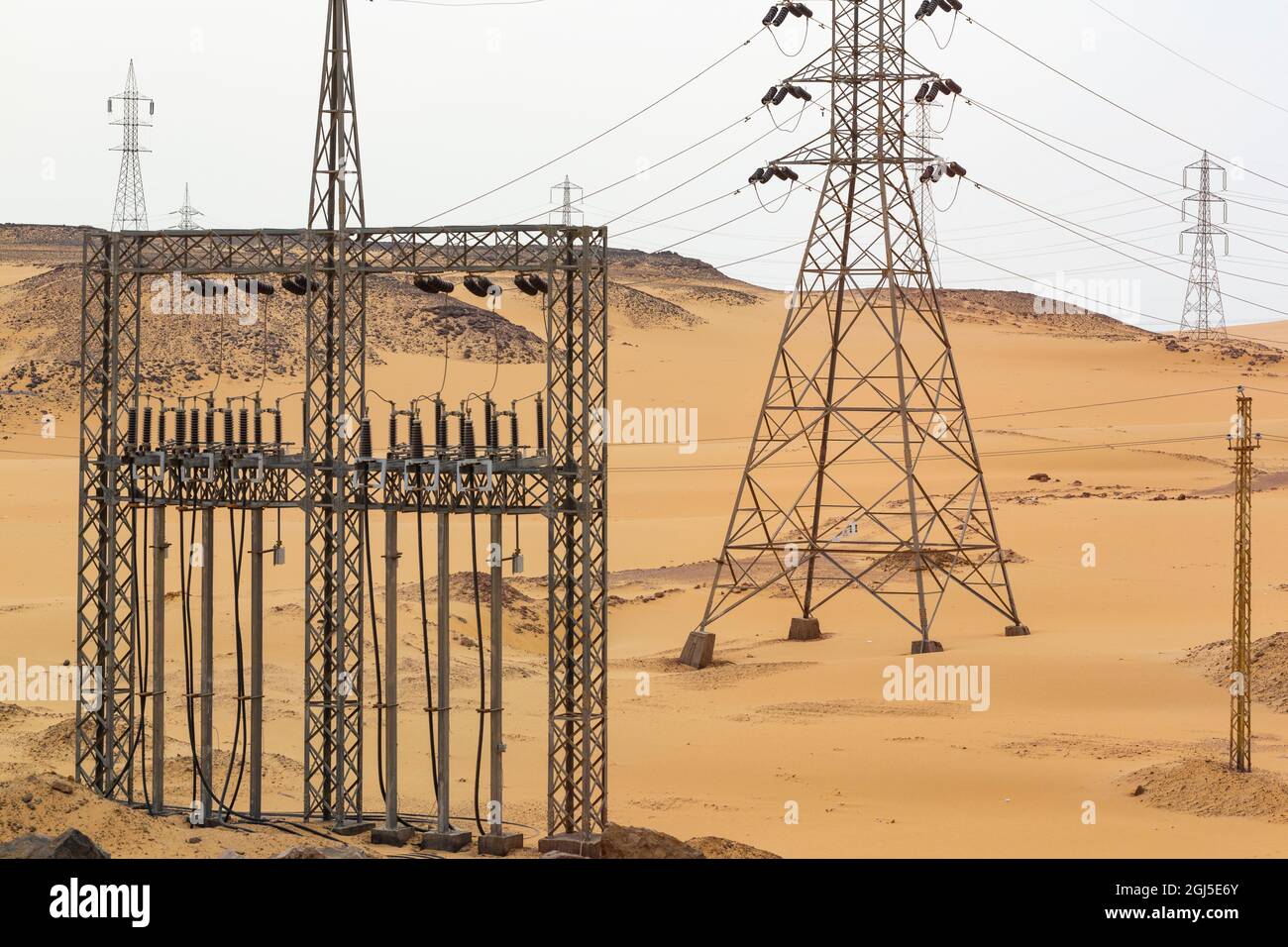 Egypt. Vast electrical grid and towers across the desert near Aswan ...